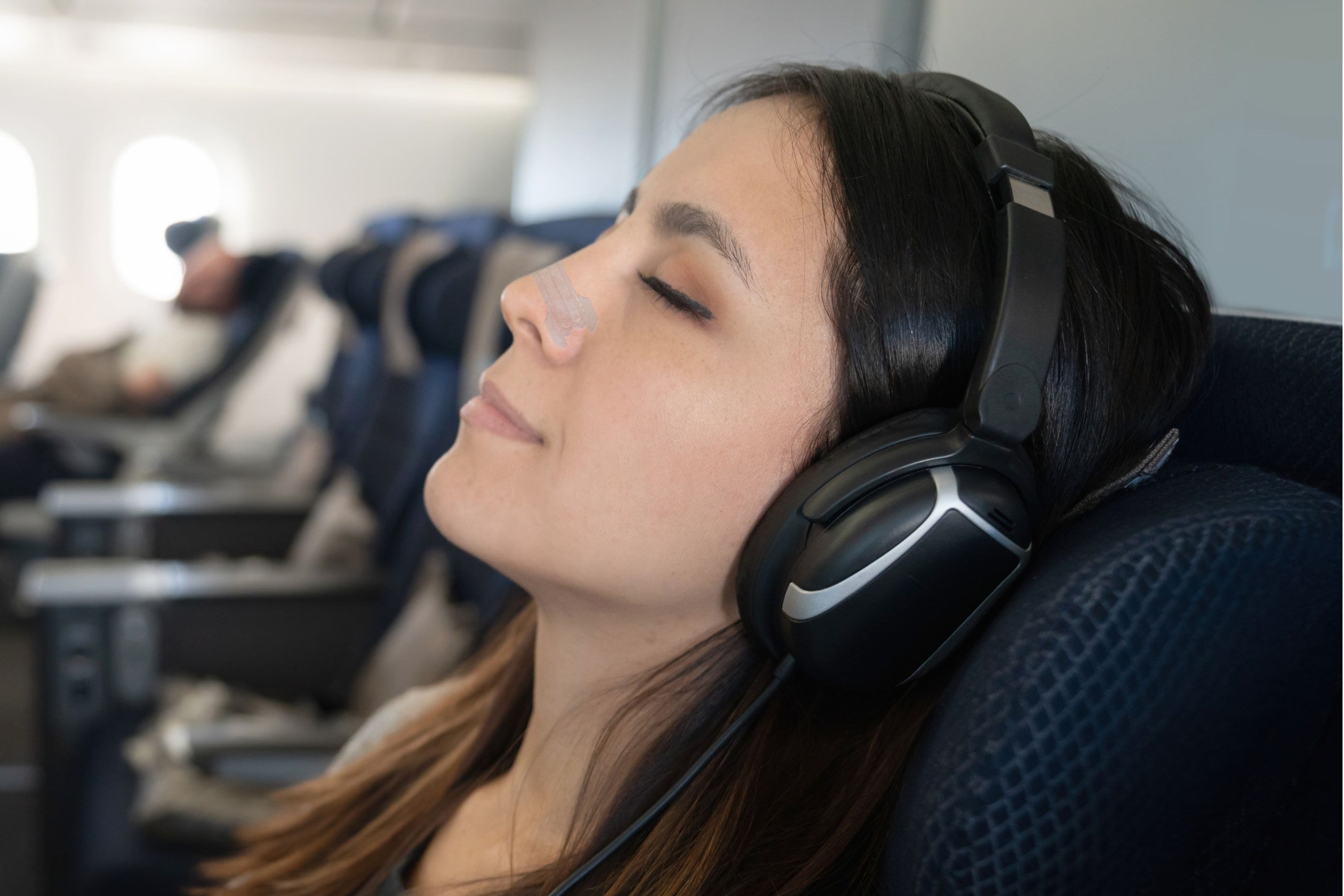 How to Sleep on a Plane: Tips for Beating Jet Lag – Good Moon